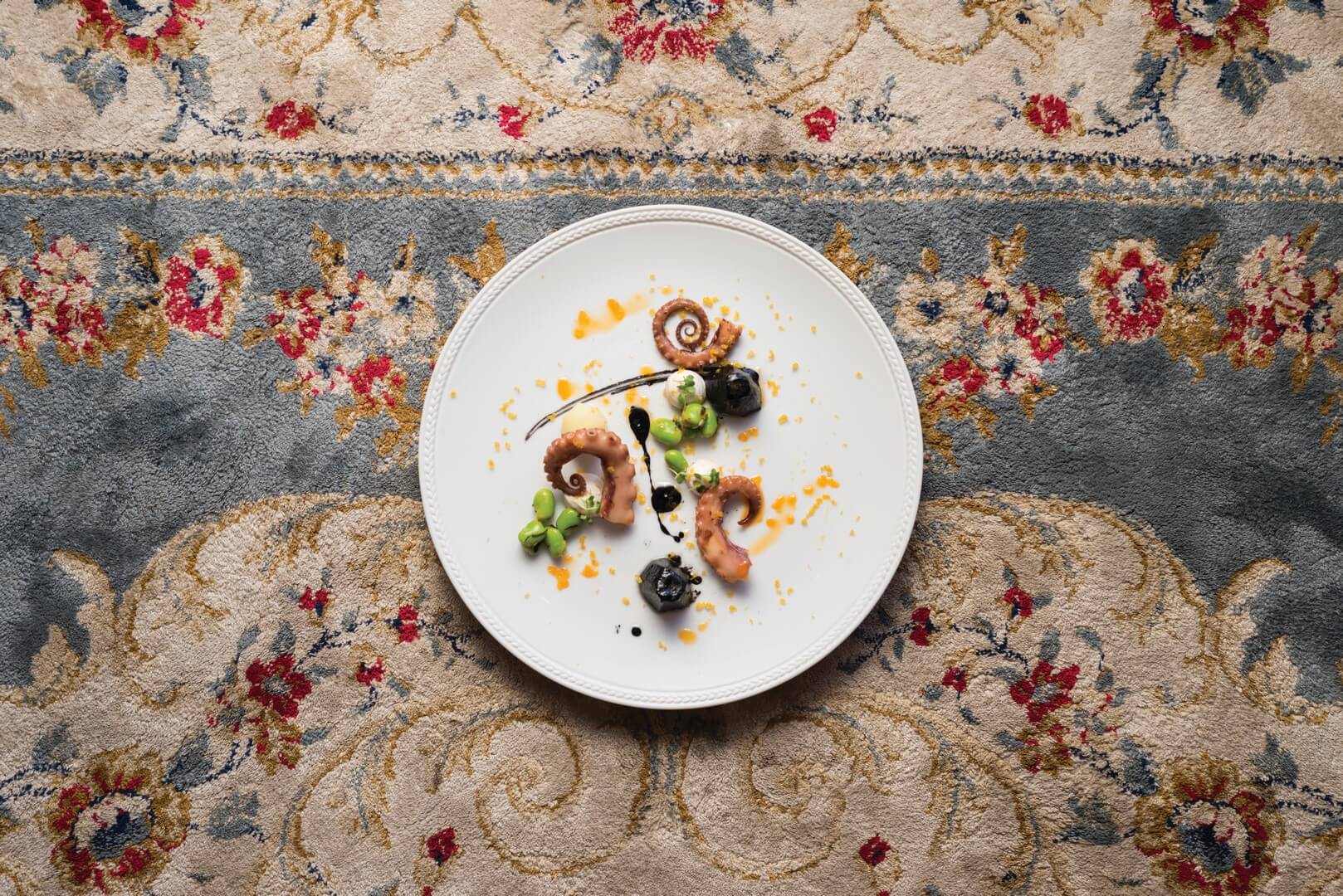 Grilled octopus with nduja oil... - Served