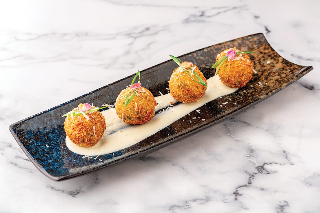 Cheesy chicken lava balls with provolone - Served